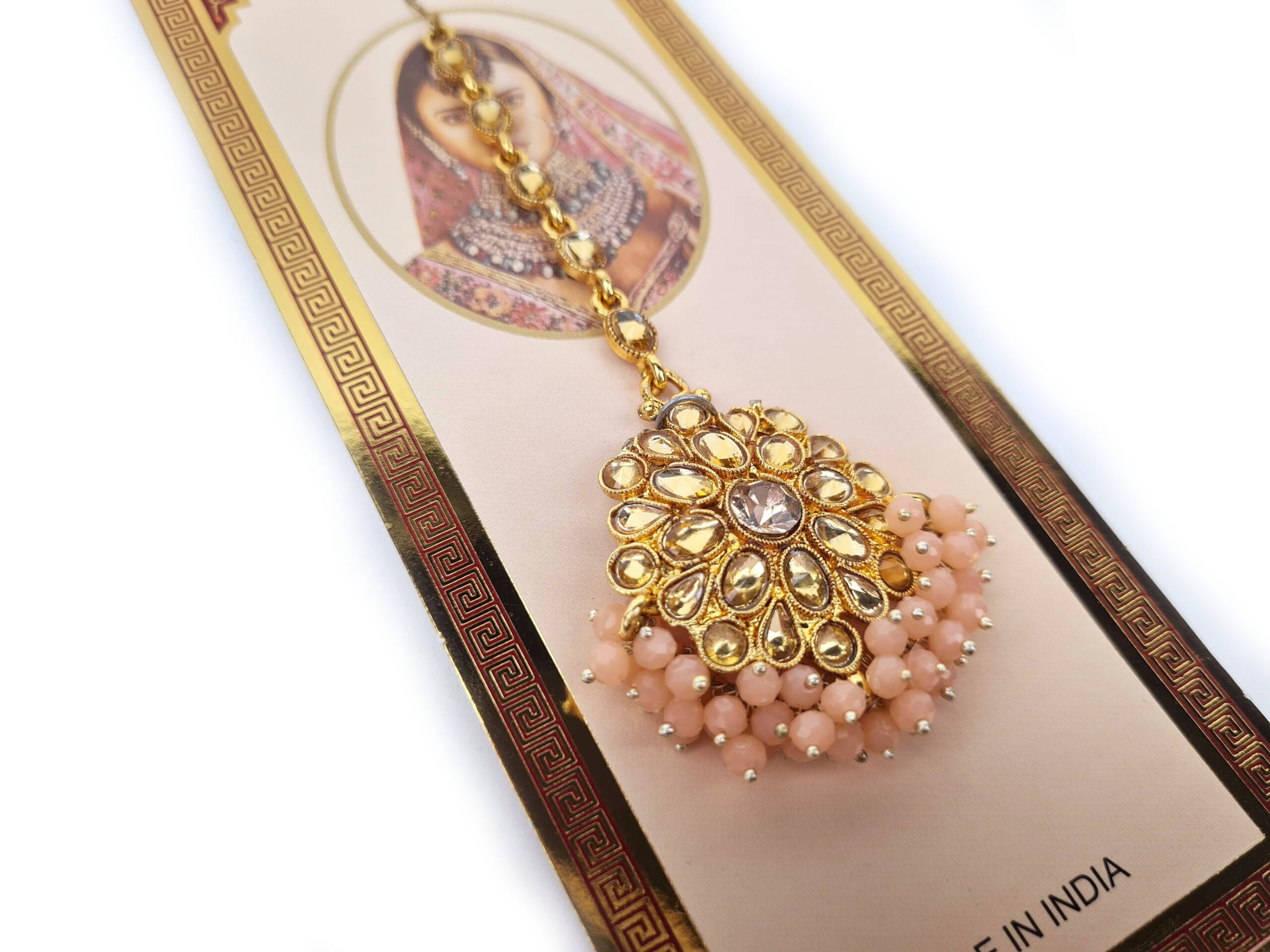 Maang Tikka dourada joia indiana de testa com pedrarias rosa pêssego ...